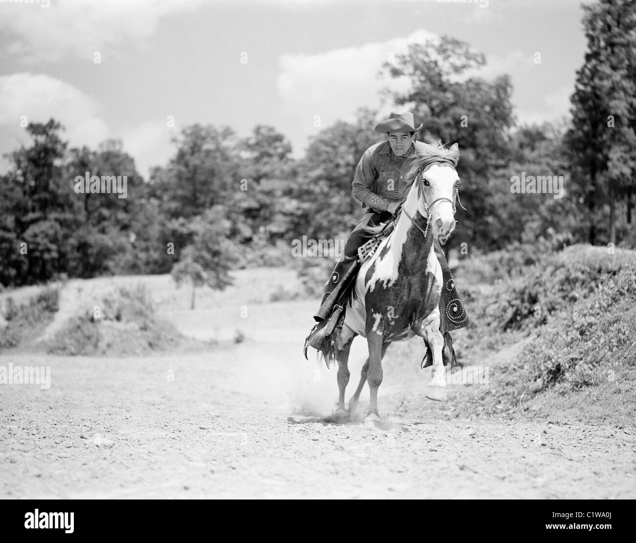 Cowboy horseback horse Black and White Stock Photos & Images - Alamy