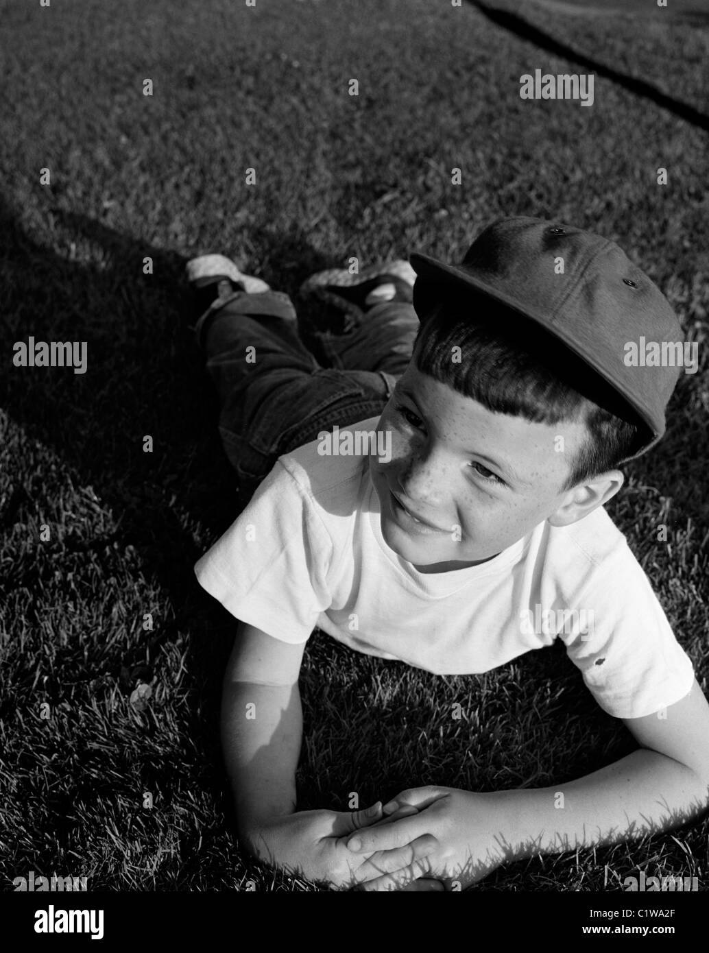 Smile lying Black and White Stock Photos & Images - Alamy