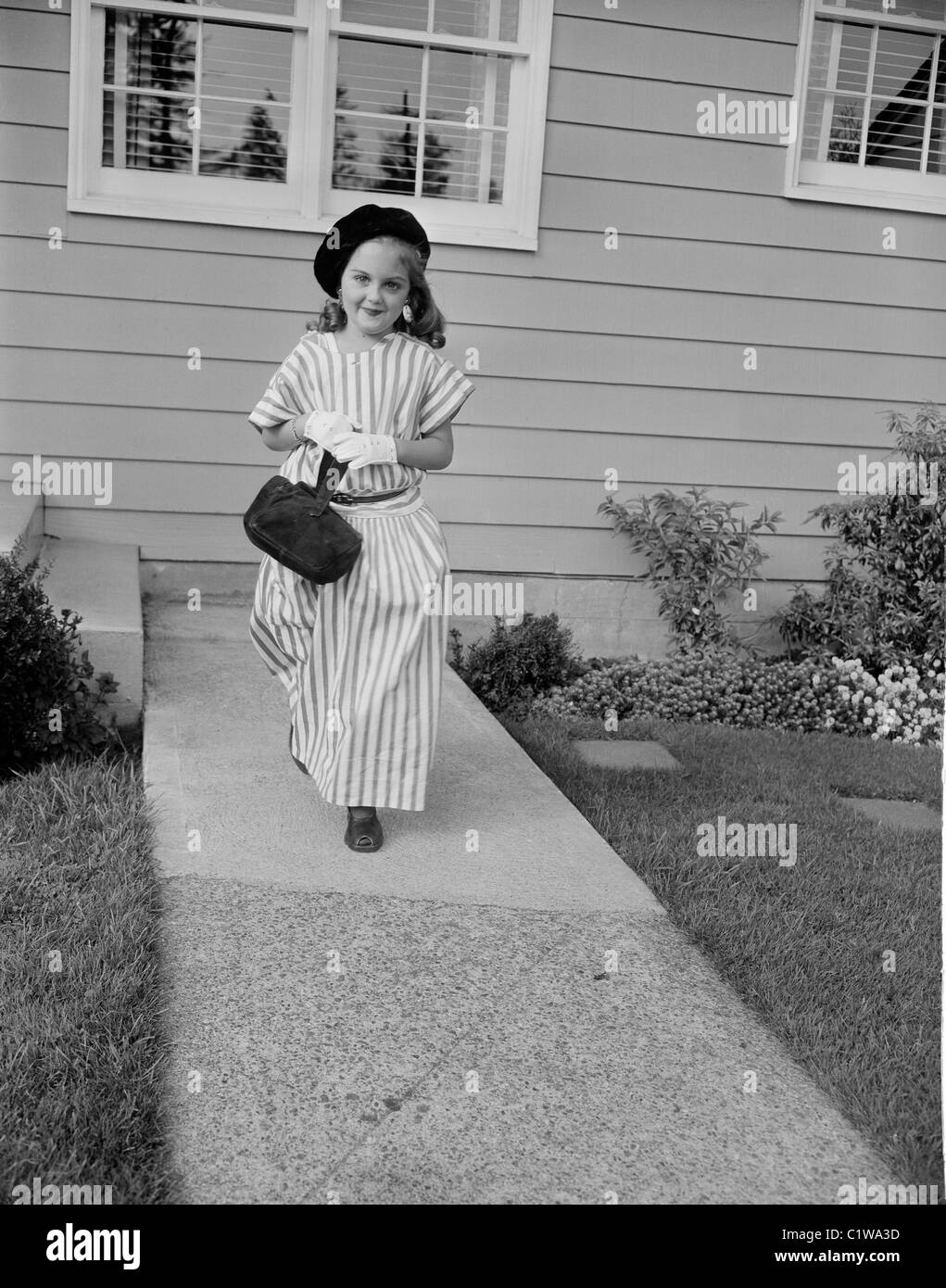 Child walking down path Black and White Stock Photos & Images - Alamy