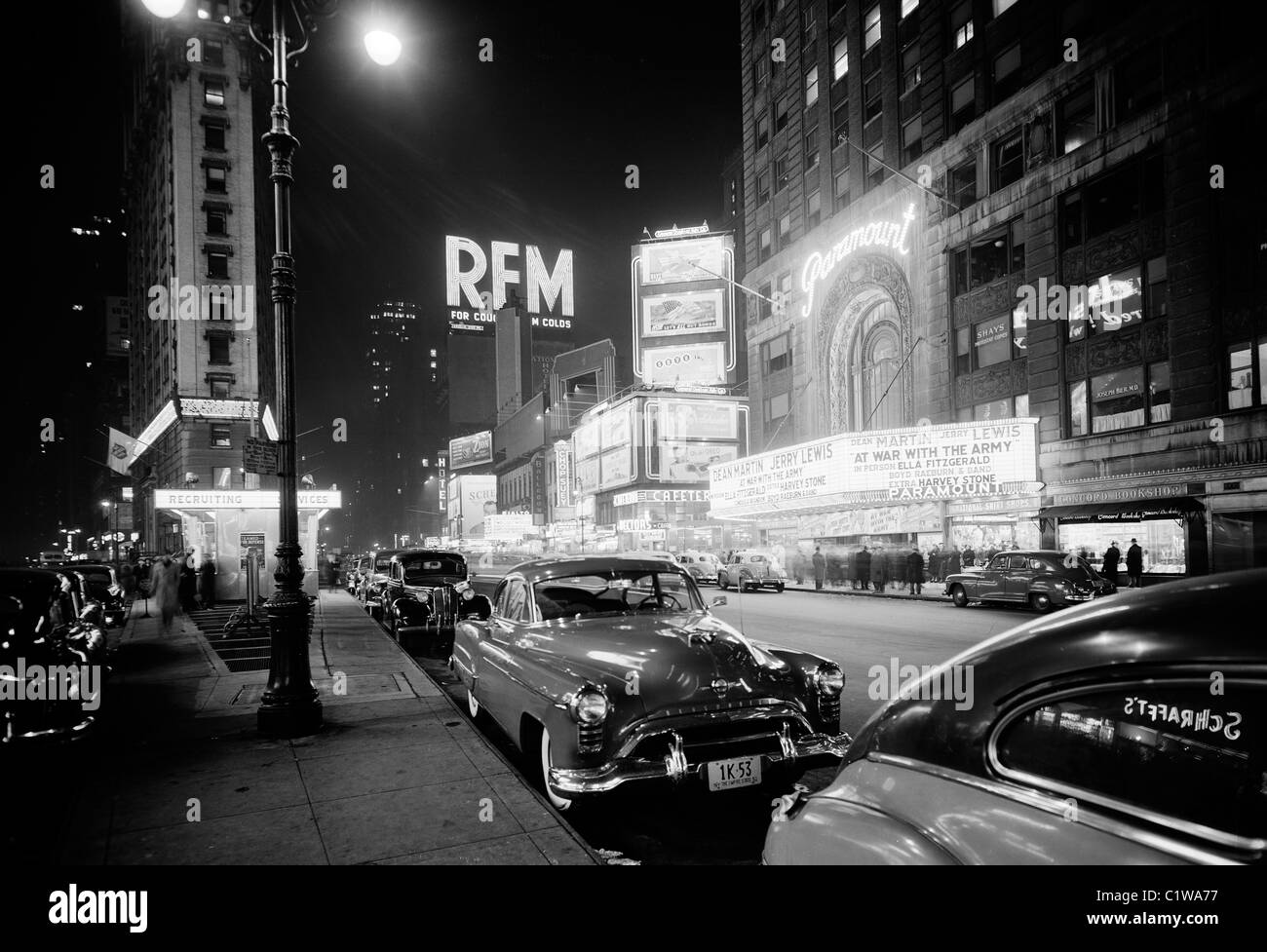 USA, New York City, Looking South on Broadway at Times Square at night ...