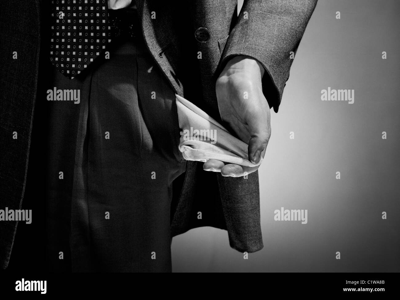 Man showing empty pocket Stock Photo - Alamy