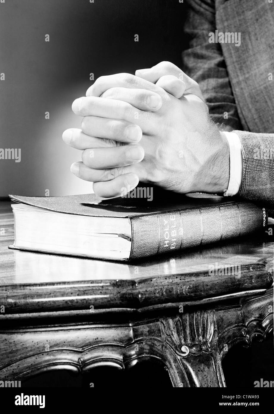 Clasped hands man Black and White Stock Photos & Images - Alamy