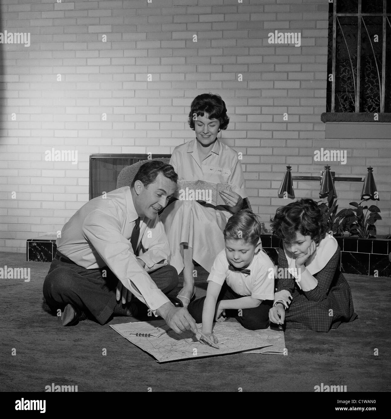 Watching parents Black and White Stock Photos & Images - Alamy