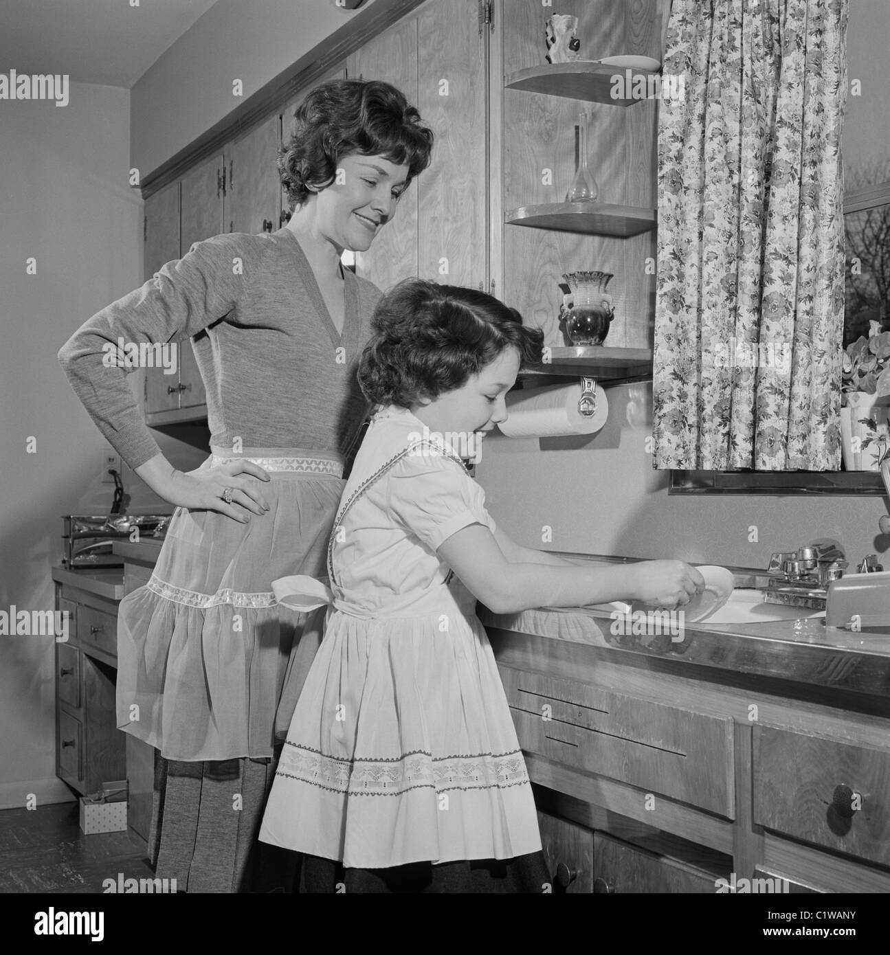 Mother child together indoors Black and White Stock Photos & Images - Alamy