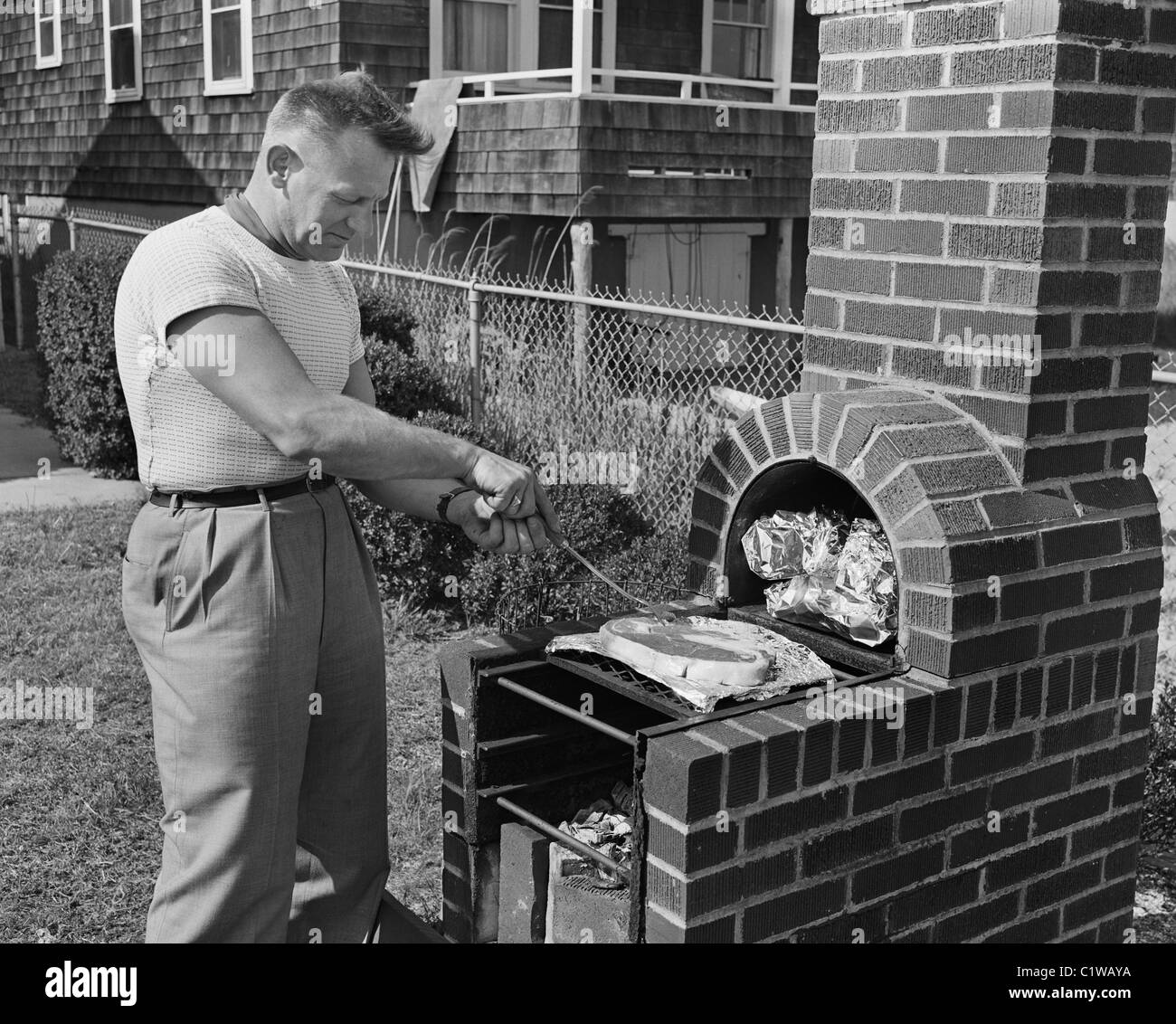 Cooking preparing Black and White Stock Photos & Images - Alamy