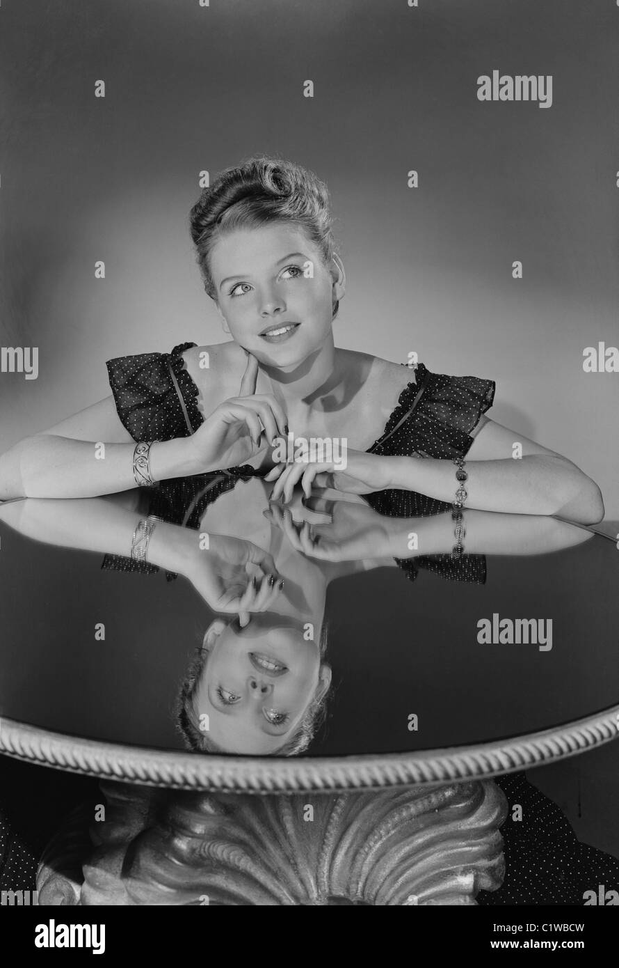 Smiling woman sitting Black and White Stock Photos & Images - Alamy