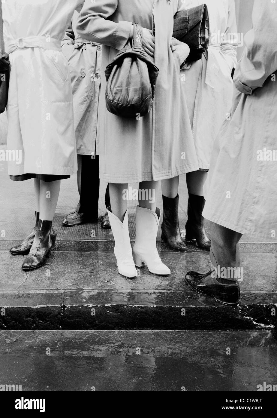 People standing sidewalk Black and White Stock Photos & Images - Alamy