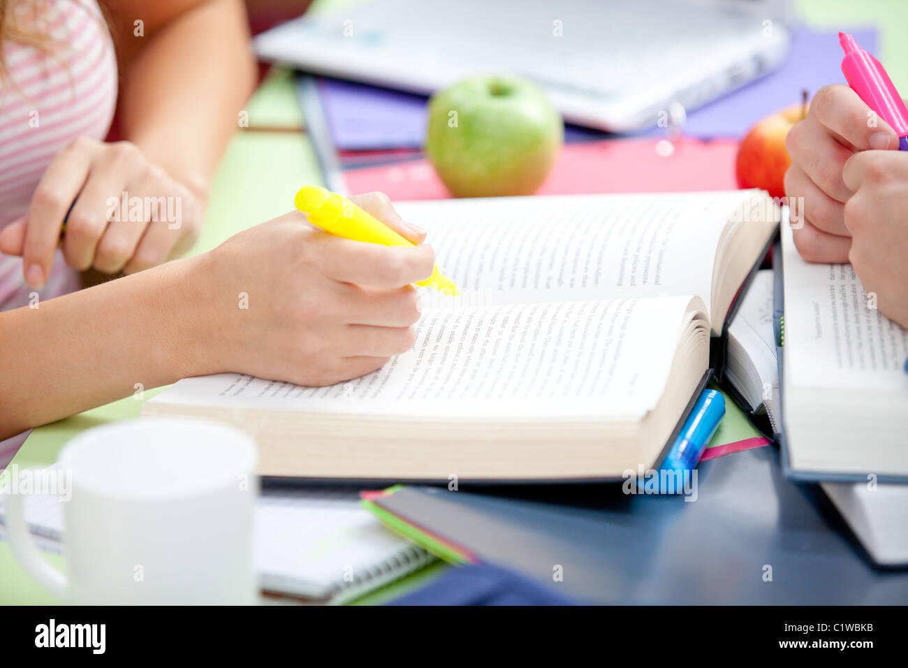 Close-up of two students studying together Stock Photo - Alamy