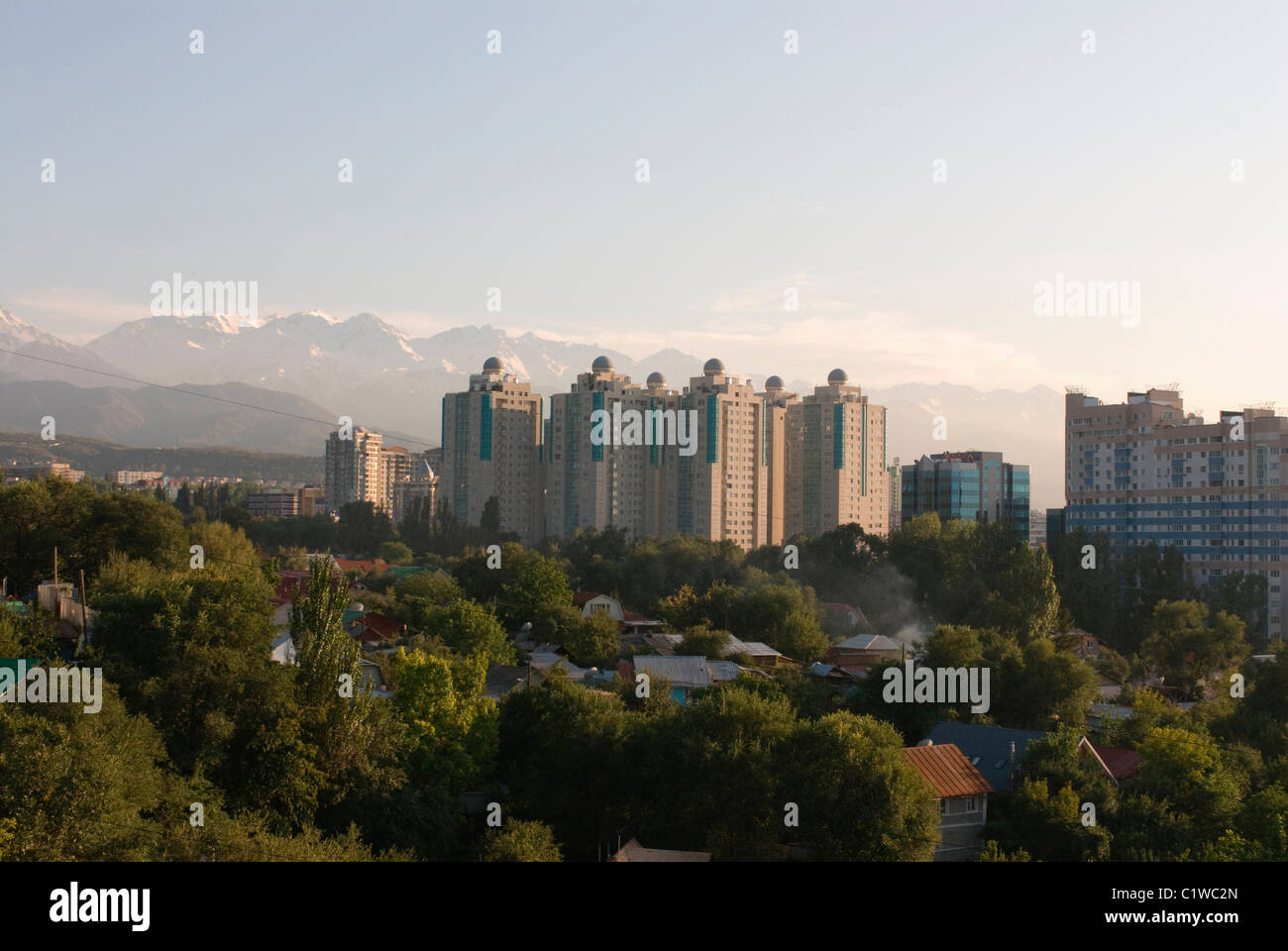 Kazakhstan, Almaty, Skyline with Altai Mountain Range in background ...