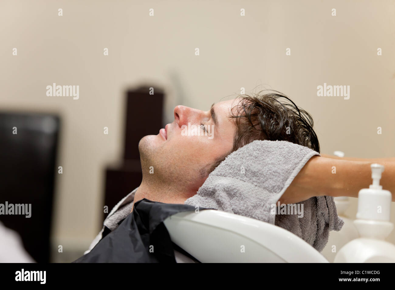 Handsome man shampooed Stock Photo - Alamy