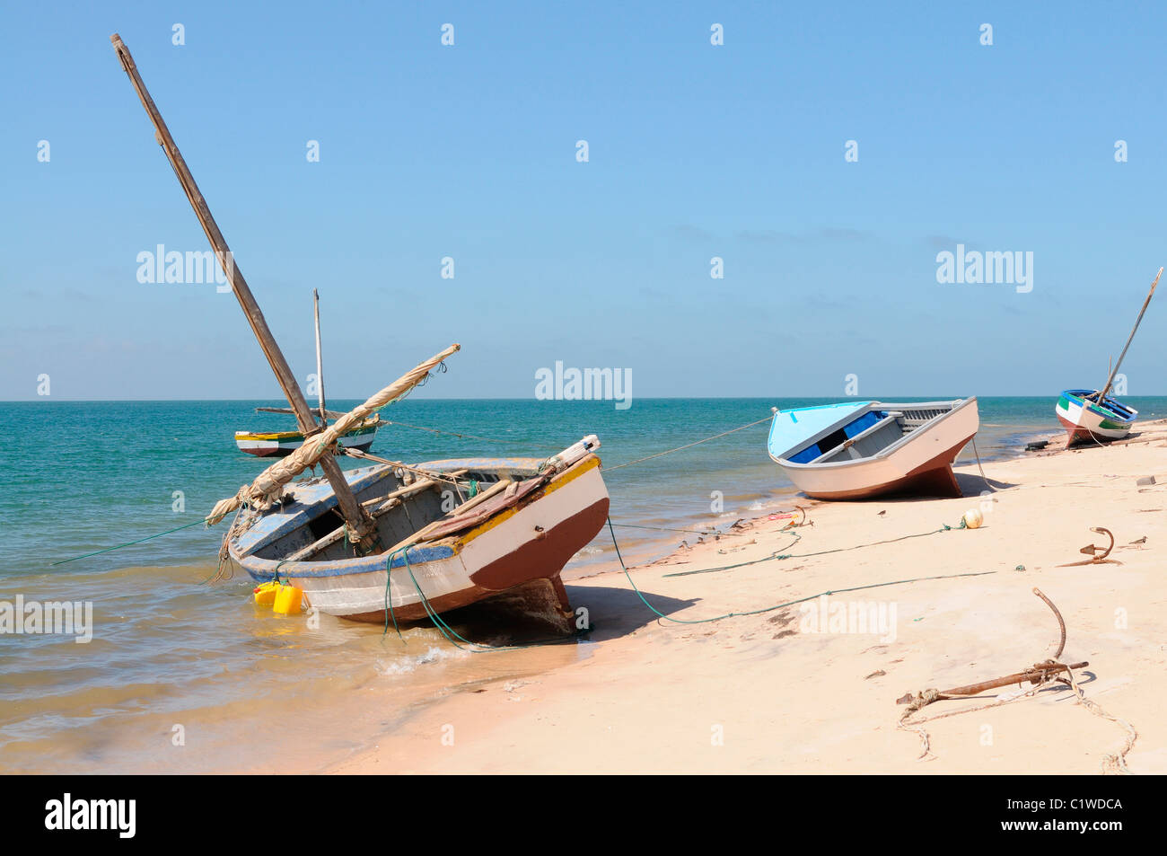 Sailboats on beach Stock Photo - Alamy