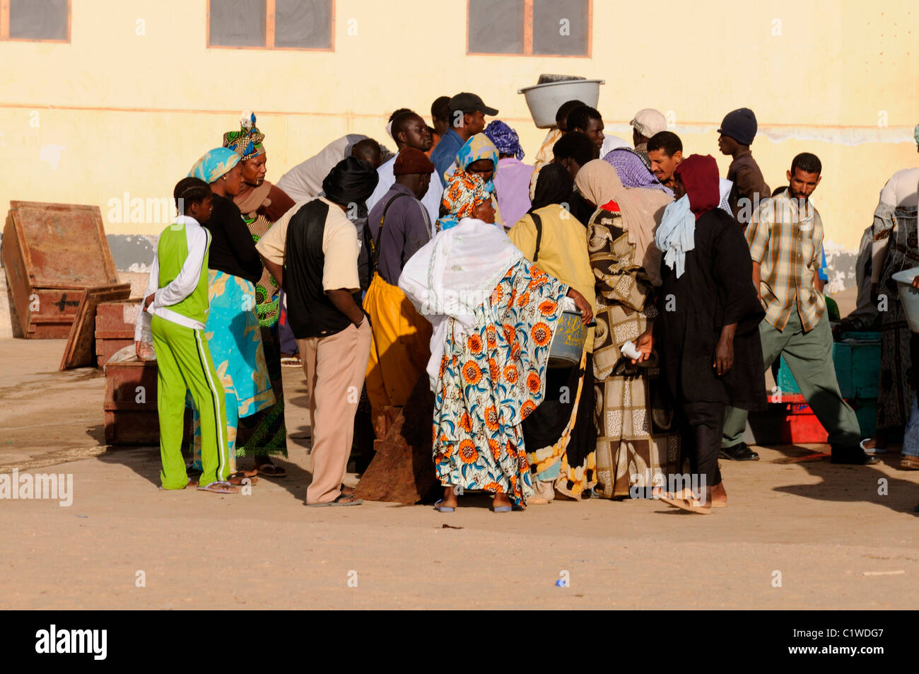 Mauritania, Nouakchott, Crowd of people buying fish Stock Photo - Alamy
