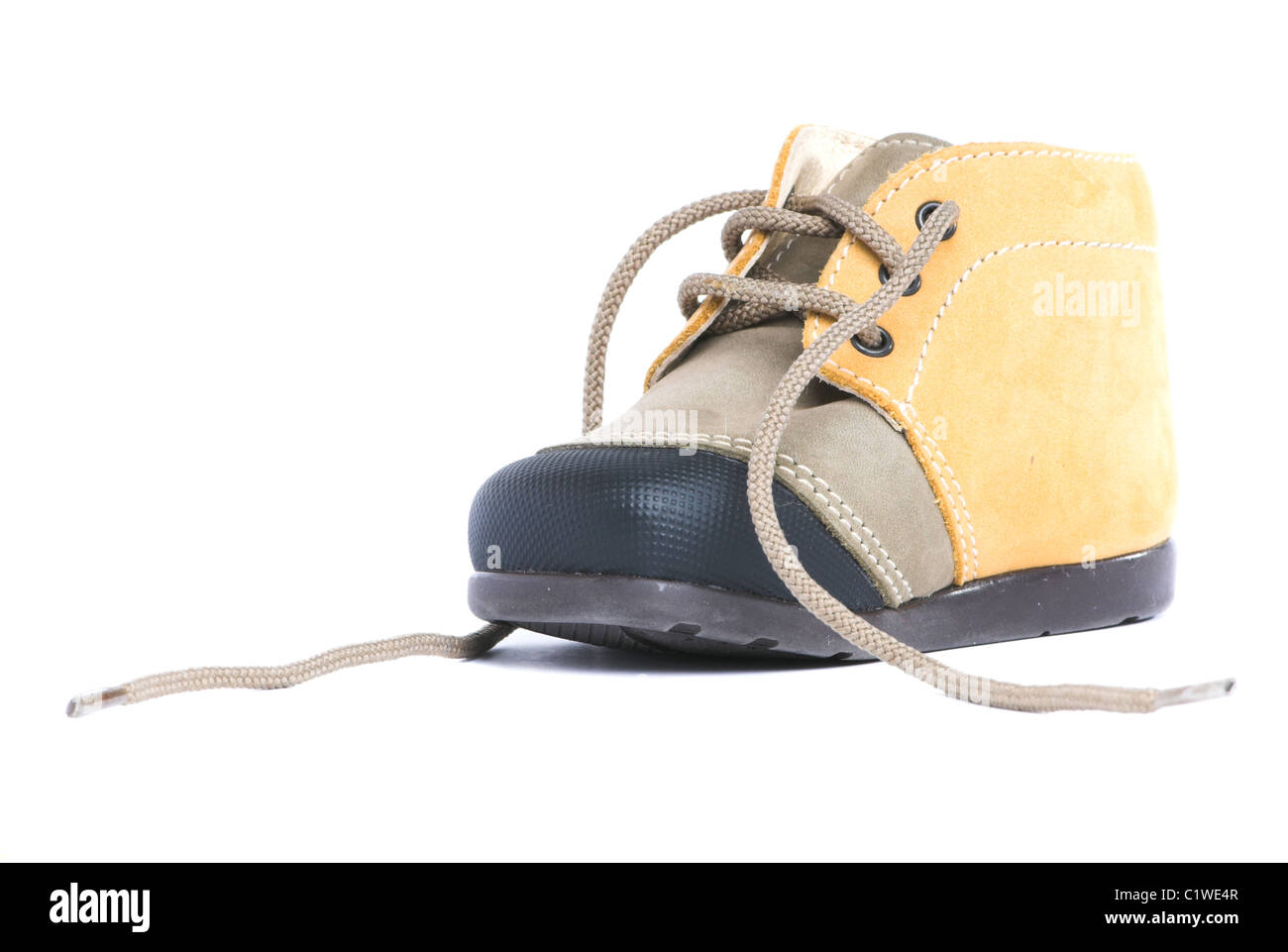 Untied baby boot isolated on white background Stock Photo - Alamy