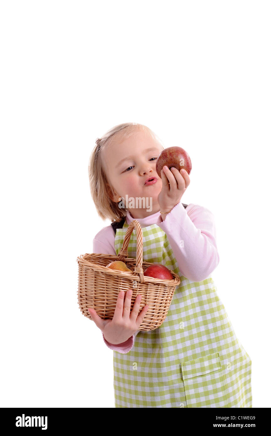 Little Girl With Basket Full Of Apples Isolated On White Stock Photo