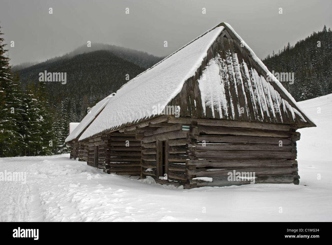 Old house covered with snow Stock Photo - Alamy
