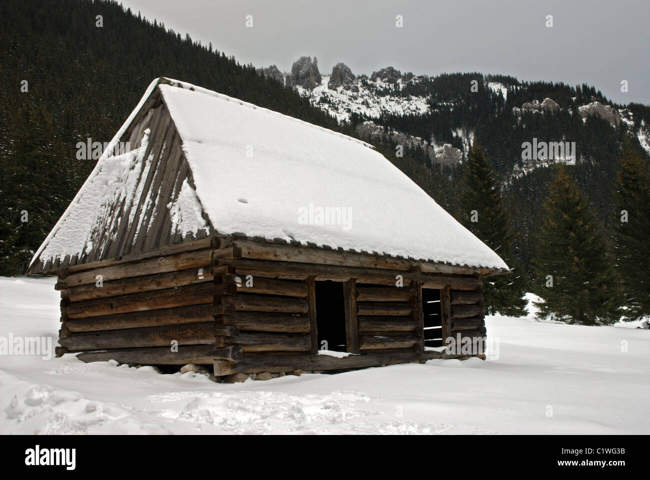 Old house covered with snow Stock Photo - Alamy
