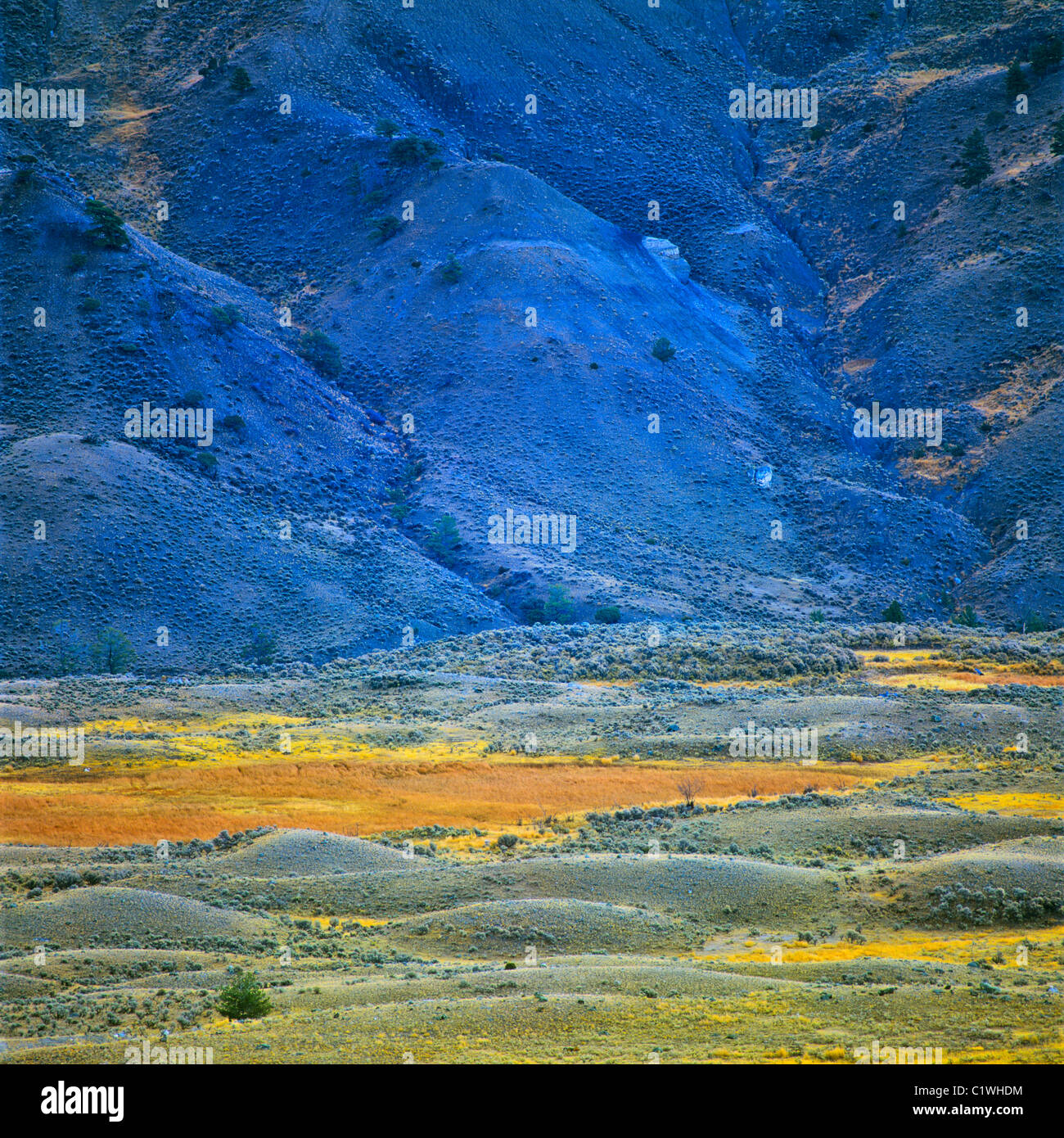 Hot spring with a mountain range in the background, Mount Everts ...