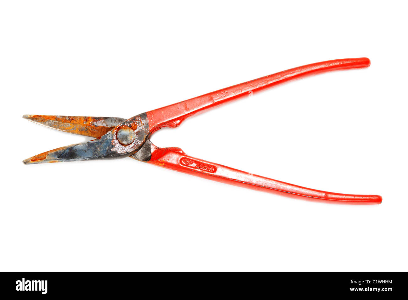 Rusty scissors on metal with red handle on white background Stock Photo ...
