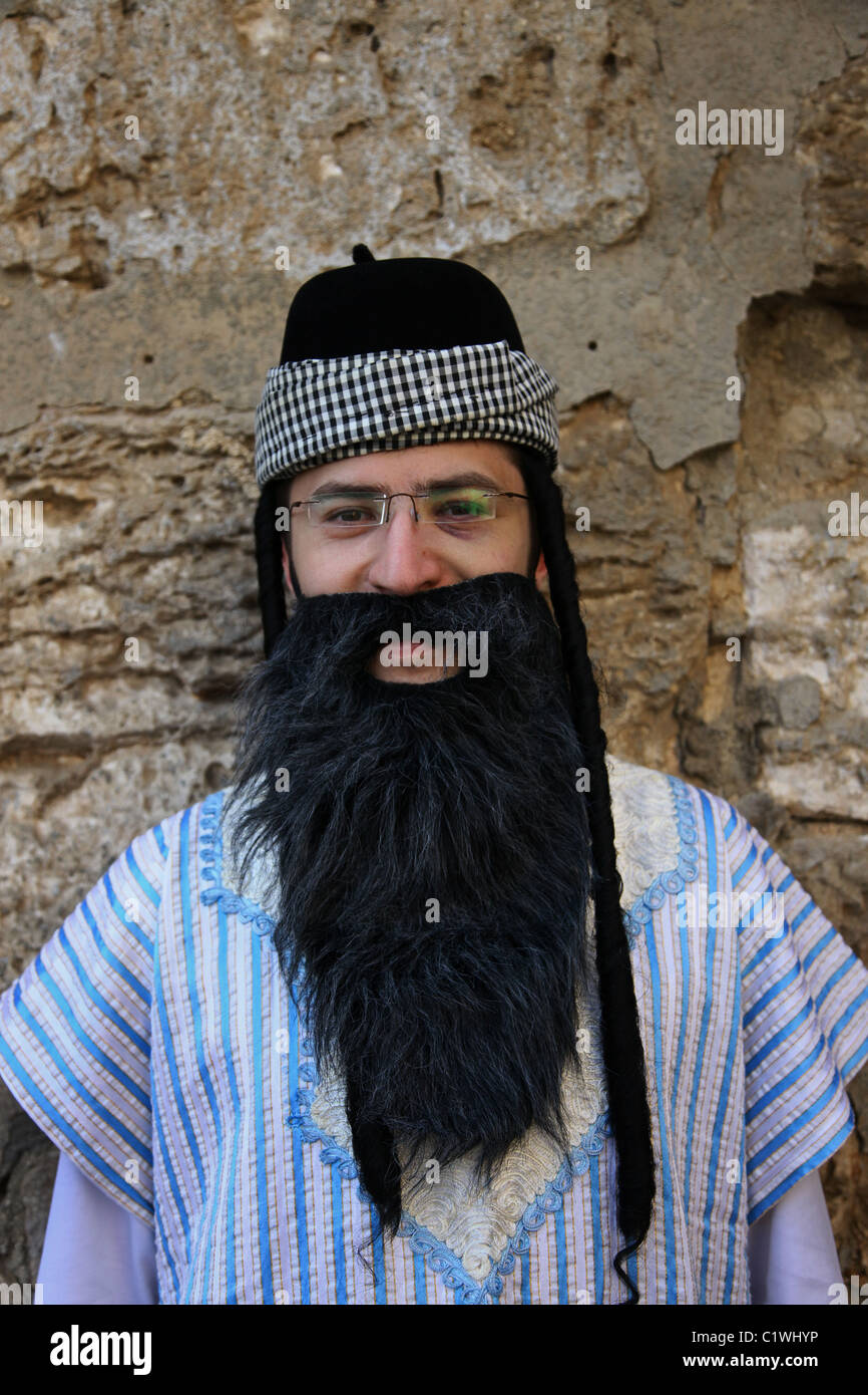 An Ultra Orthodox Jew wearing costume during Purim festival in the ...