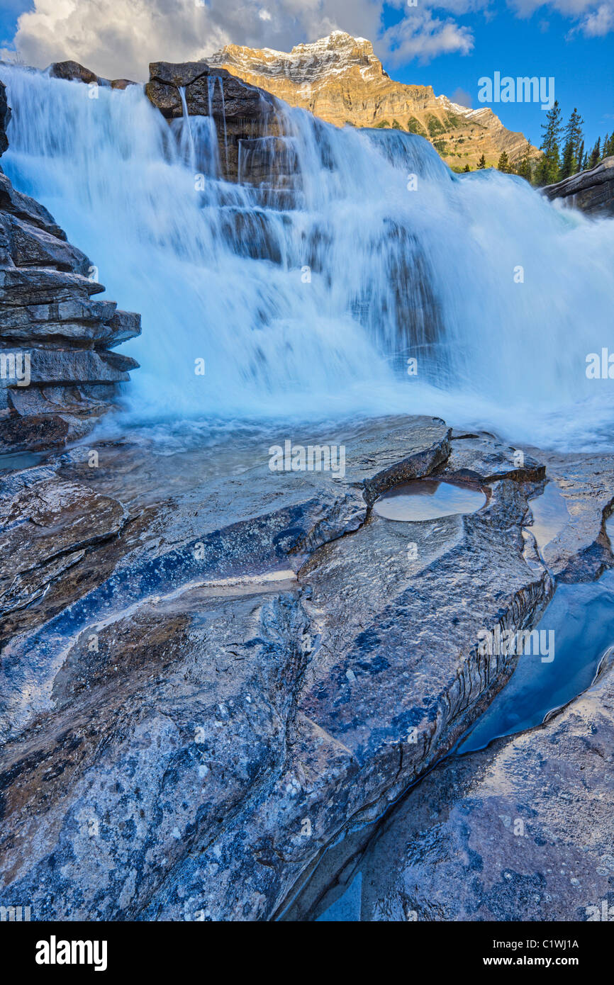 Low angle view of a waterfall, Athabasca Falls, Jasper National Park ...