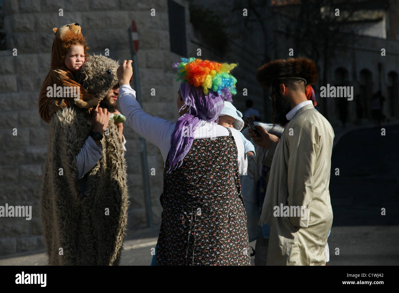 Orthodox Jews wear costume during the feast of Purim in Mea Shearim ...
