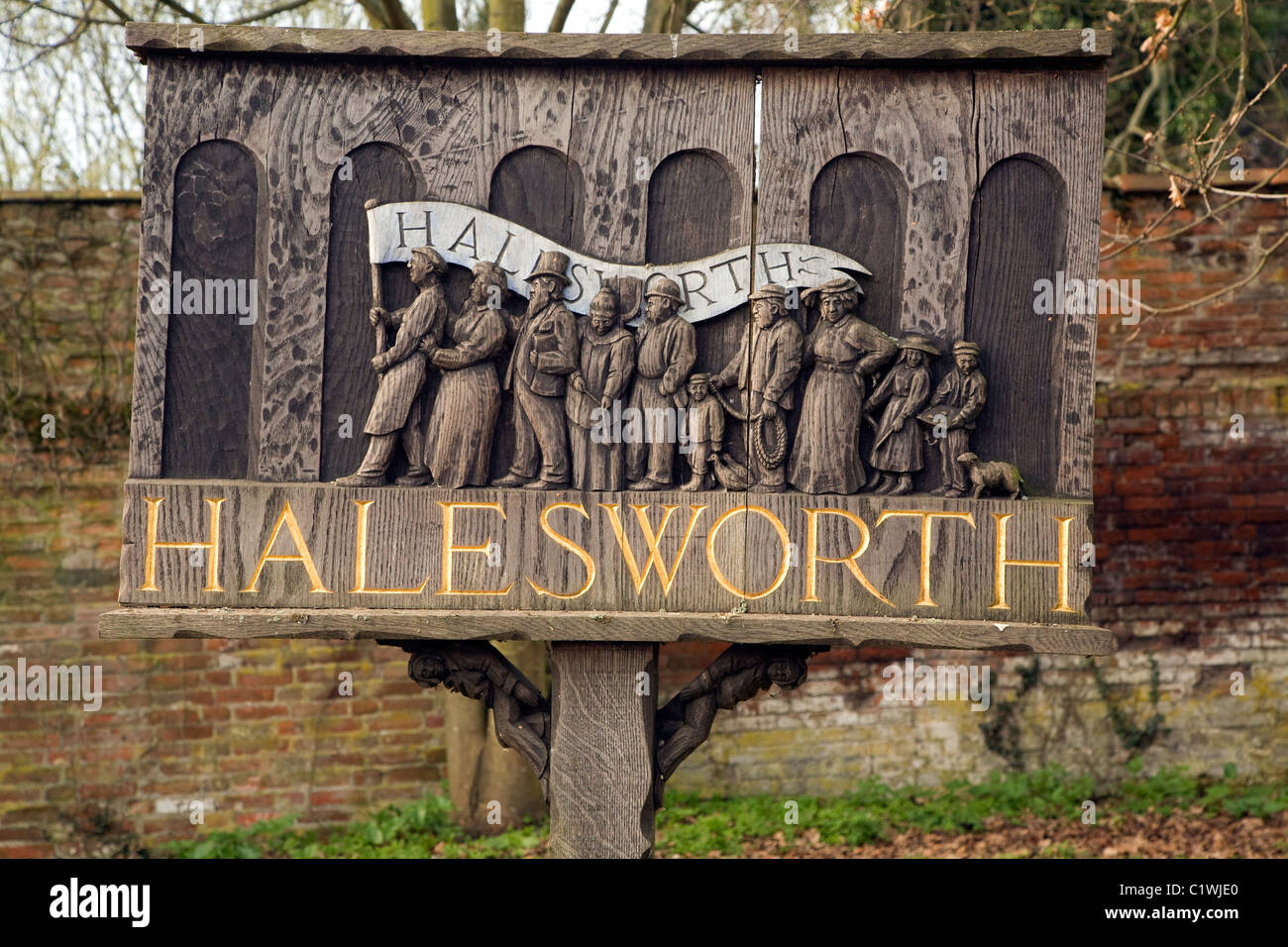 Wooden village sign Halesworth Suffolk Stock Photo - Alamy