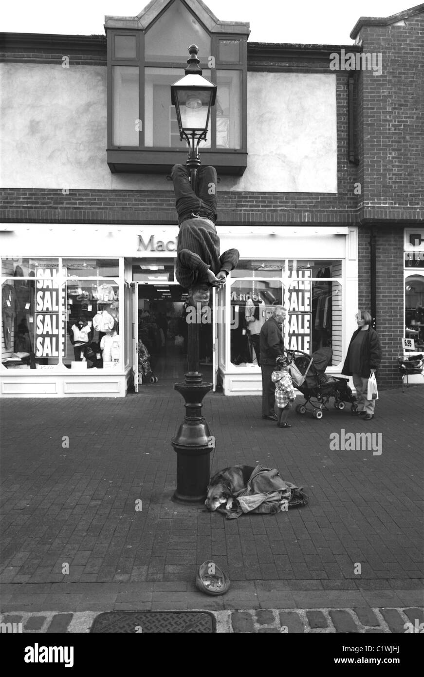Man hanging upside down from hi-res stock photography and images - Alamy