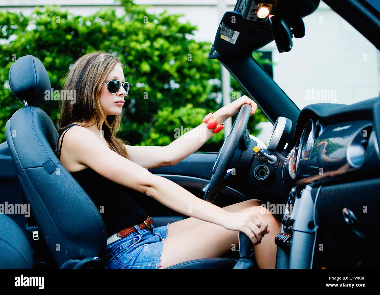 Woman driving a car Stock Photo - Alamy