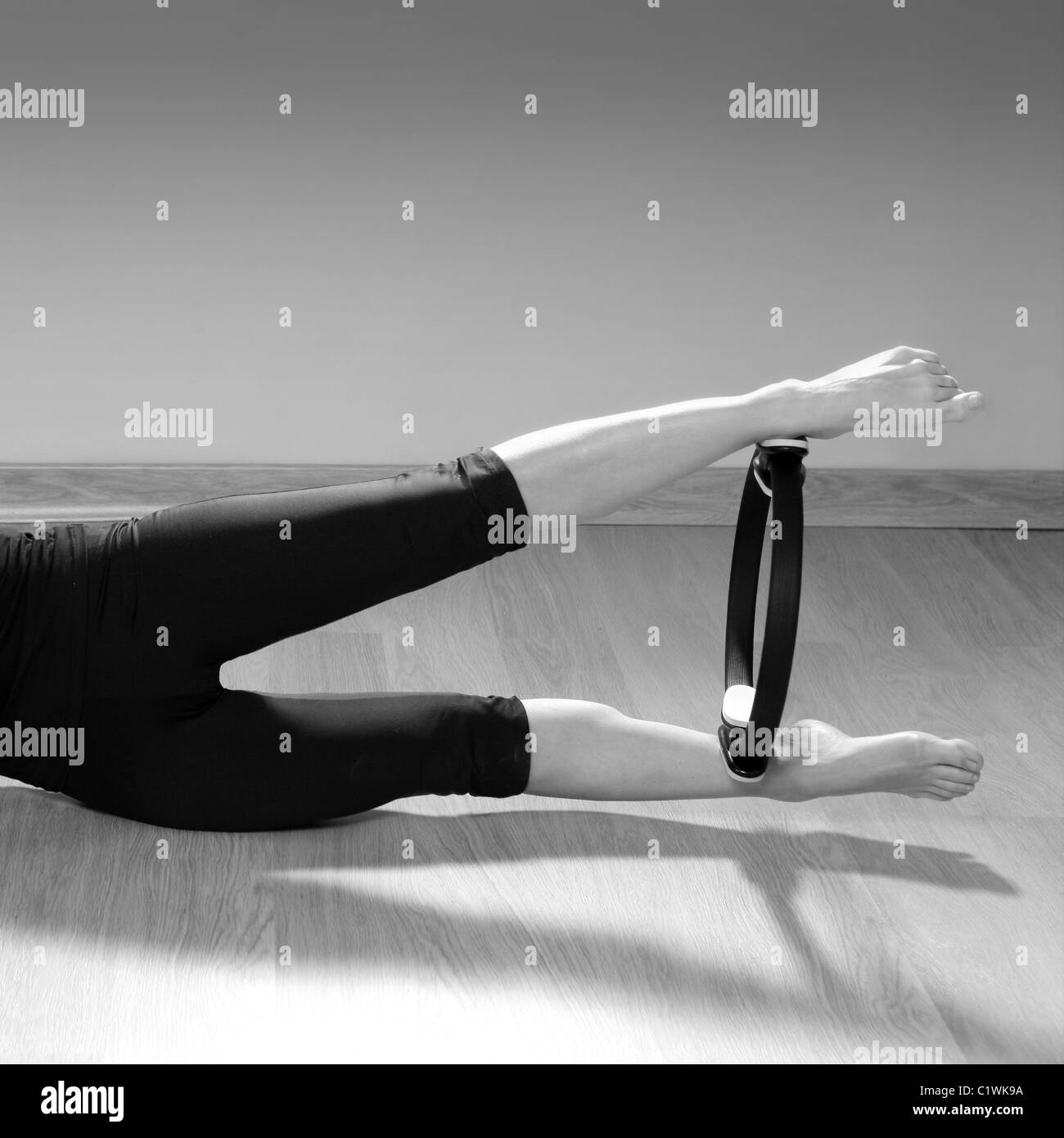 magic pilates ring woman aerobics sport gym exercises on wooden floor ...