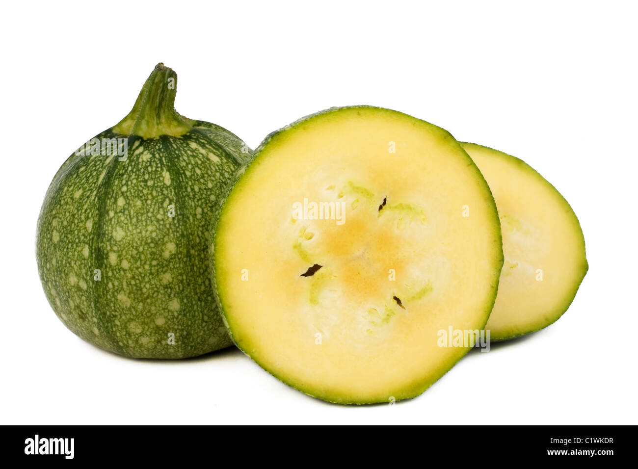 Food - Vegetables - Round zucchini, entire and sectioned Stock Photo ...