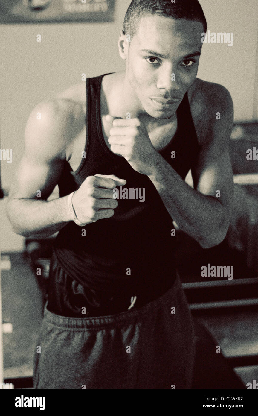 Portrait of a male boxer in fighting stance Stock Photo - Alamy