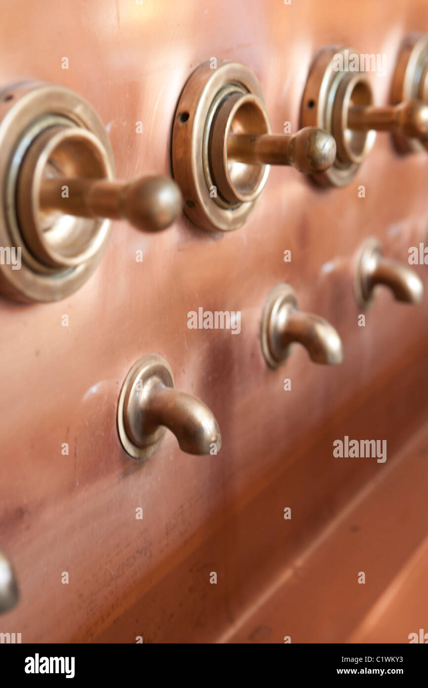 Beer Sampling taps, copper, in Heineken brewery. Amsterdam, Netherlands ...