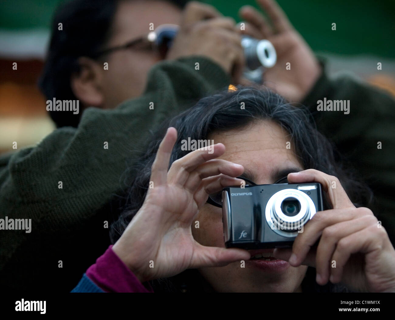 Blind students take pictures during a photography workshop for the ...