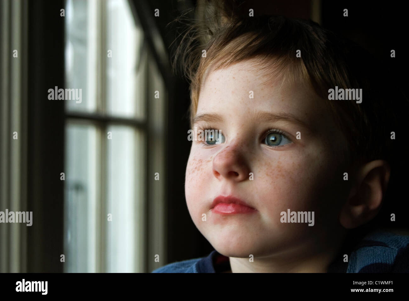 Portrait of a young boy as he's playing Stock Photo - Alamy