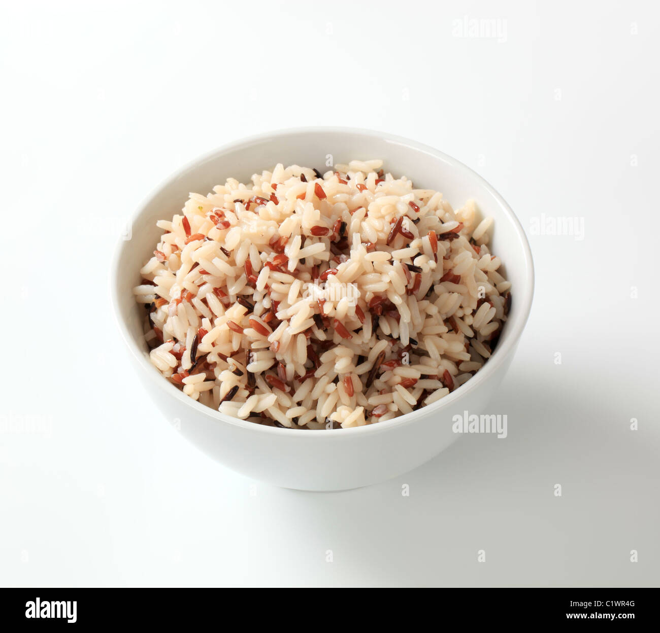 Bowl of cooked mixed rice - studio Stock Photo - Alamy