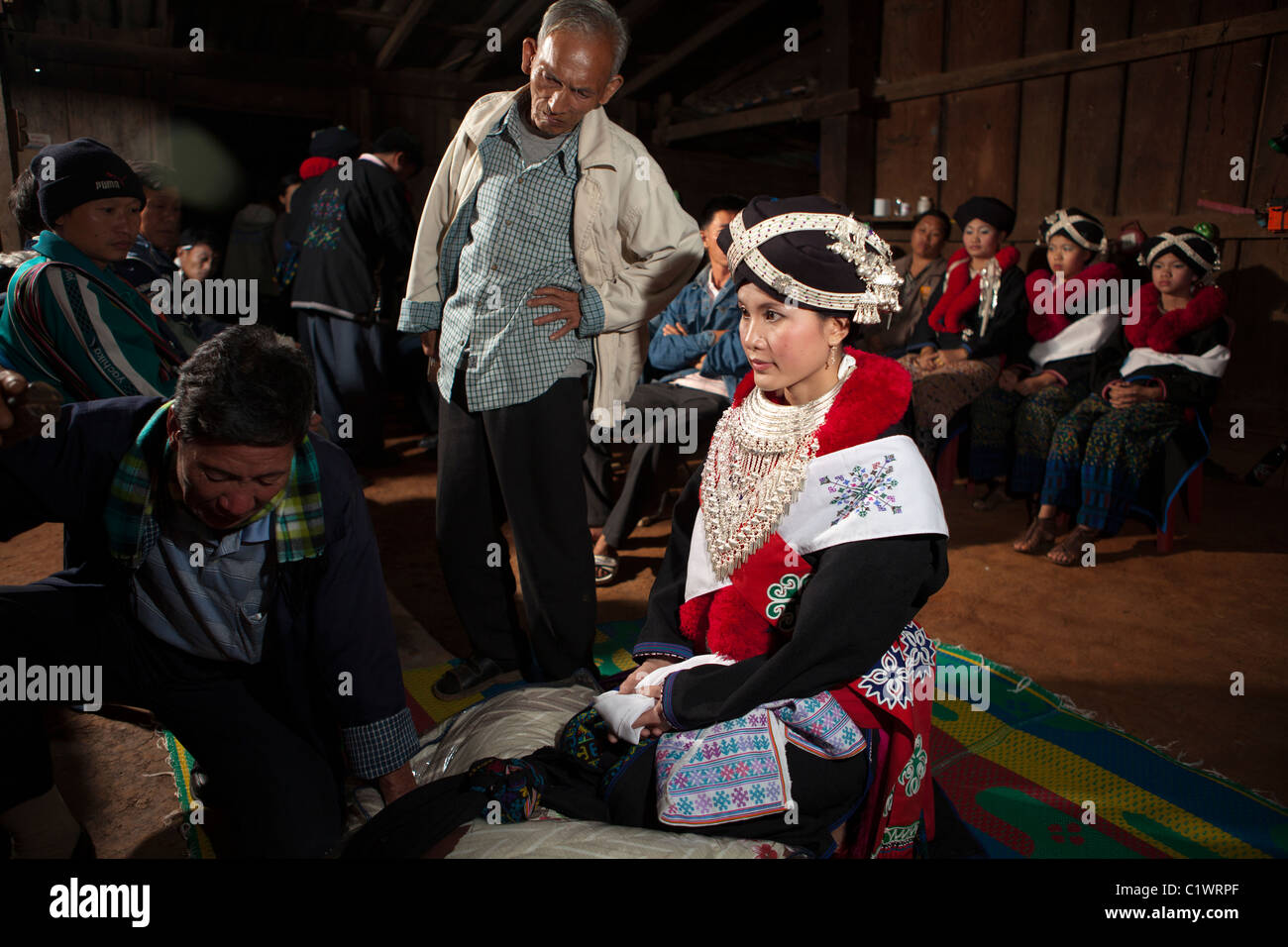 Iu Mien(Yao) shaman looking the fortune telling to bride, Ban Bur ...