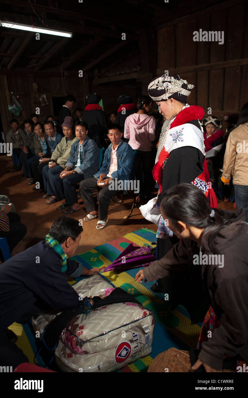 Iu Mien(Yao) shaman looking the fortune telling to bride, Ban Bur ...
