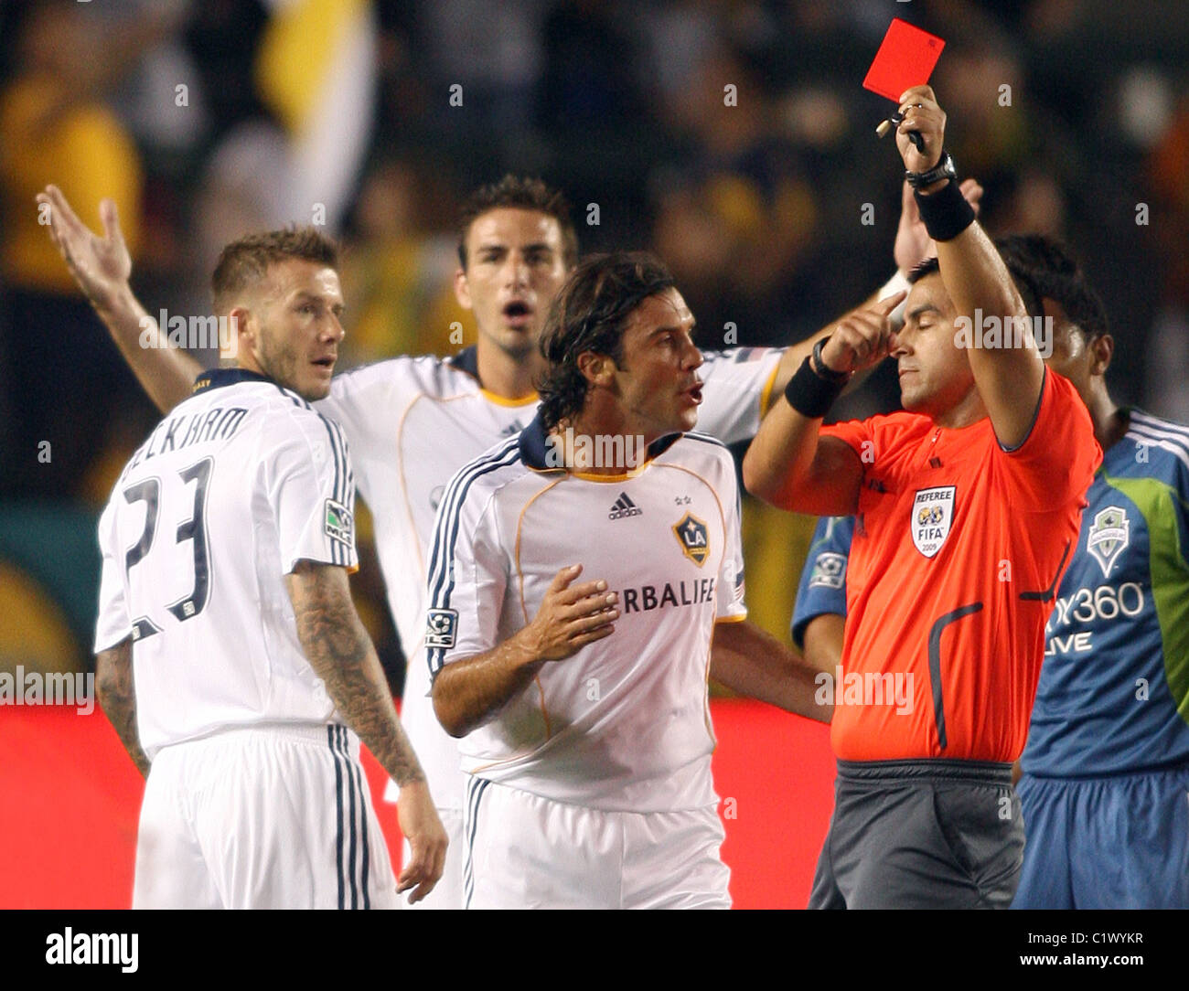 David Beckham of the Los Angeles Galaxy is sent off with a red card for ...
