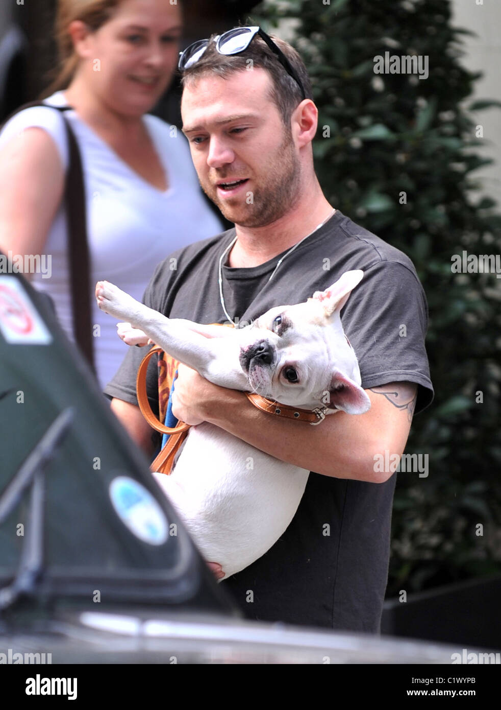 Tom Crane leaves his hotel with girlfriend Sarah Harding's dog Corker ...