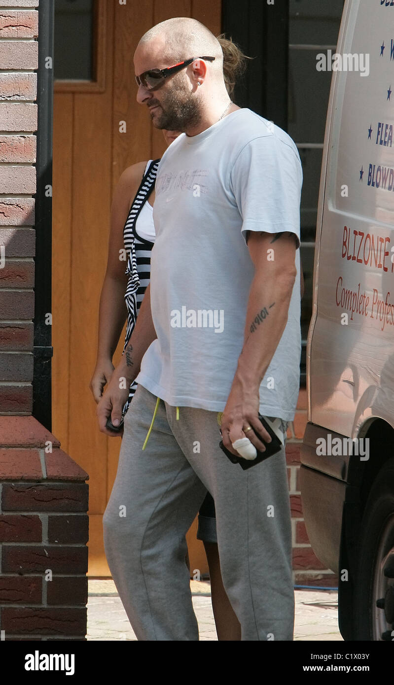 Kerry Katona and husband Mark Croft at home. The couple took their ...