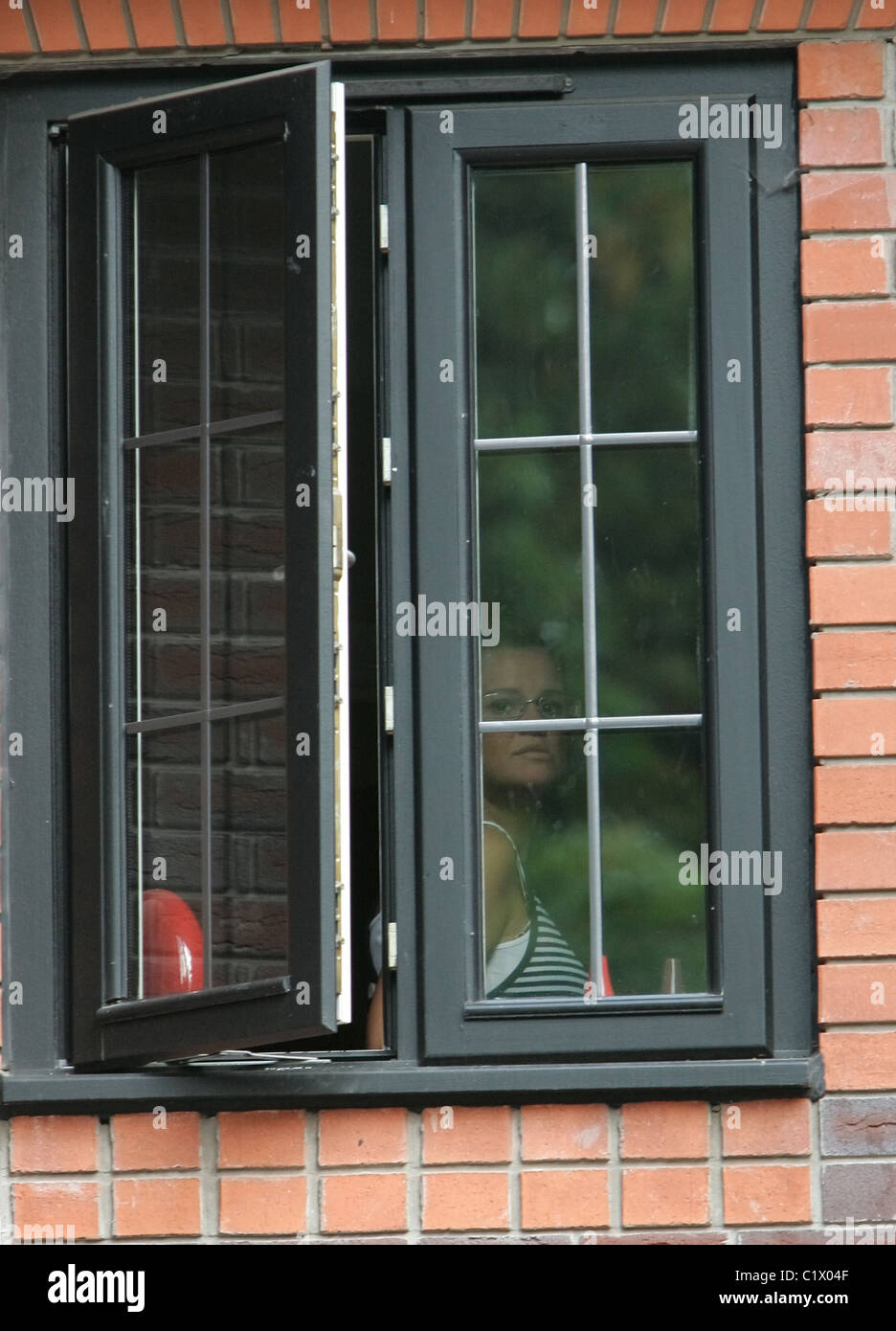 Kerry Katona and husband Mark Croft at home. The couple took their ...