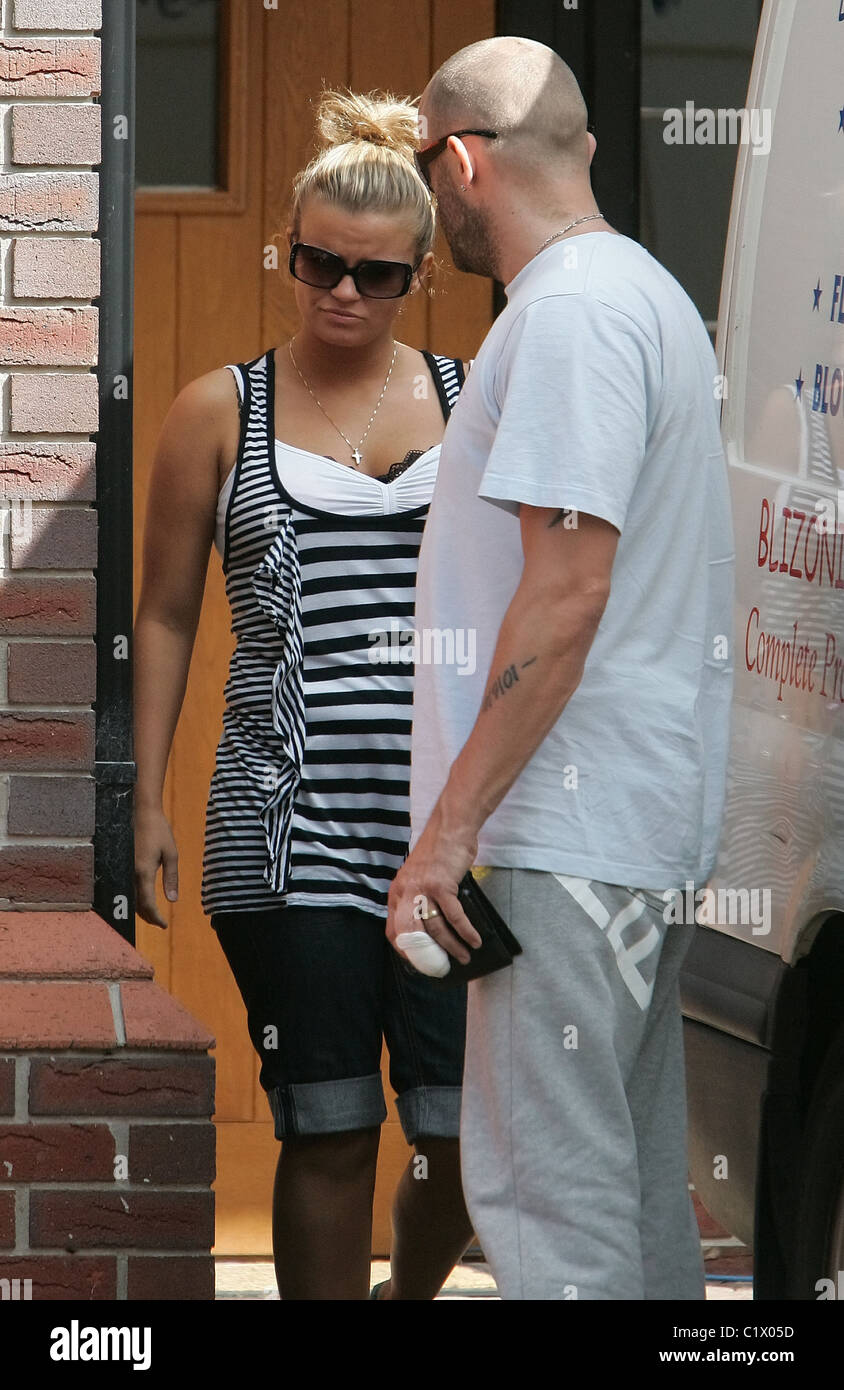 Kerry Katona and husband Mark Croft at home. The couple took their ...