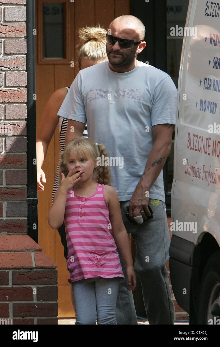 Kerry Katona and husband Mark Croft at home. The couple took their ...