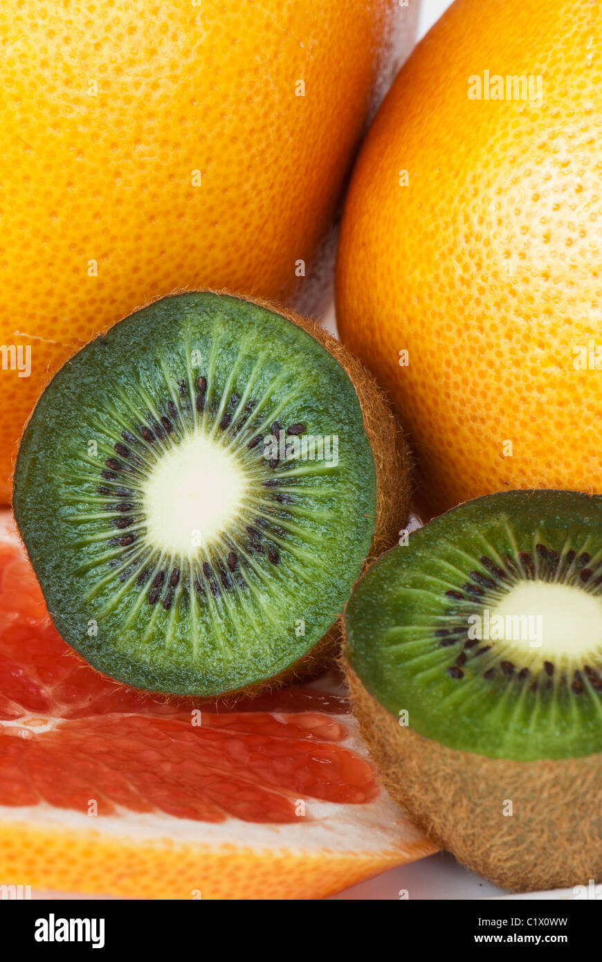 Tropical fruits: kiwi and grapefruit Stock Photo - Alamy