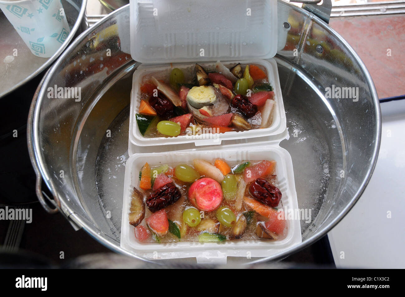 Animals keep cool at Harbin, China's Northern Forest Zoo, by eating ...