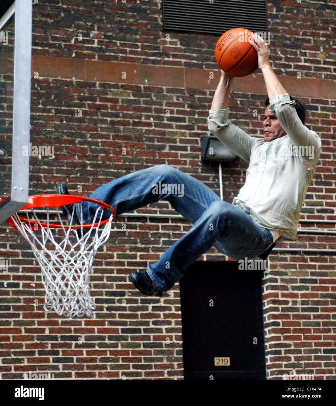 Mark Odgers performs an extreme slam dunk outside the Ed Sullivan ...