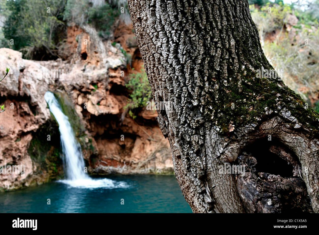 Beautiful waterfall with lake and wooden access located near Tavira ...