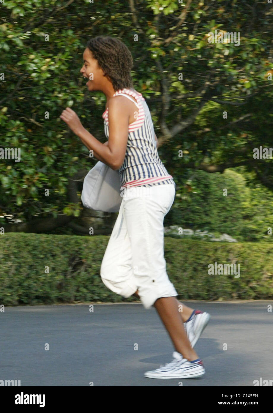 President Barack Obama's daughter Malia running on return from their ...