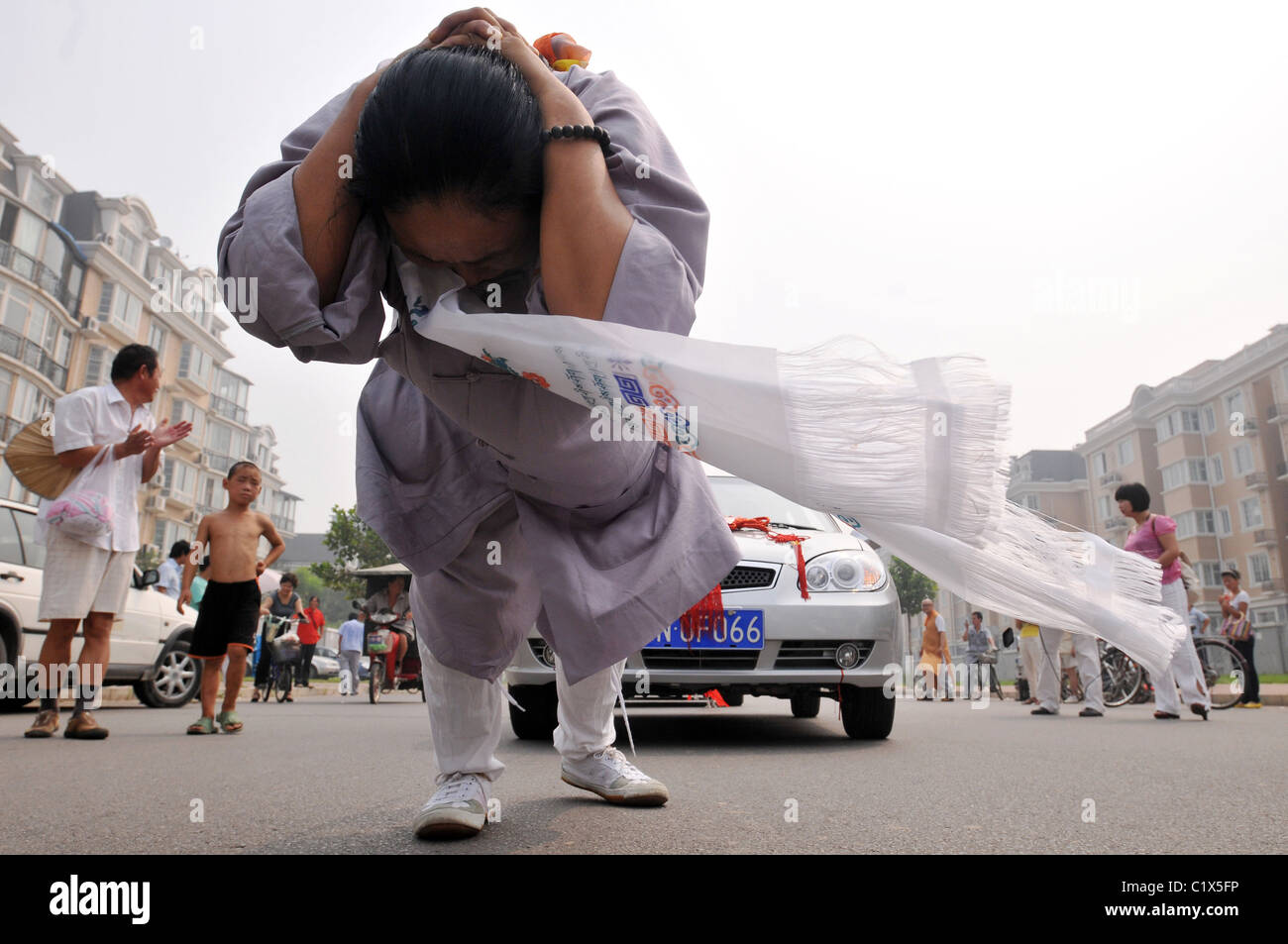 Strong hair Shi Deyu is no ordinary stuntwoman - she can pull heavy ...