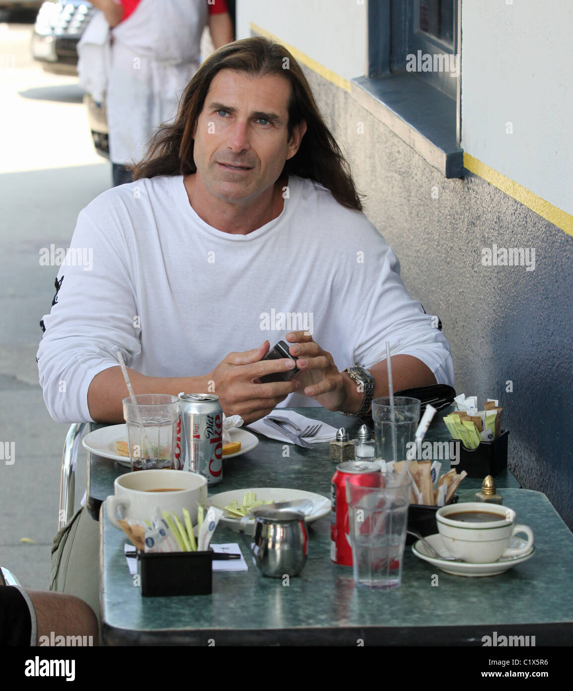 Italian fashion model Fabio Lanzoni has lunch with friends at La ...